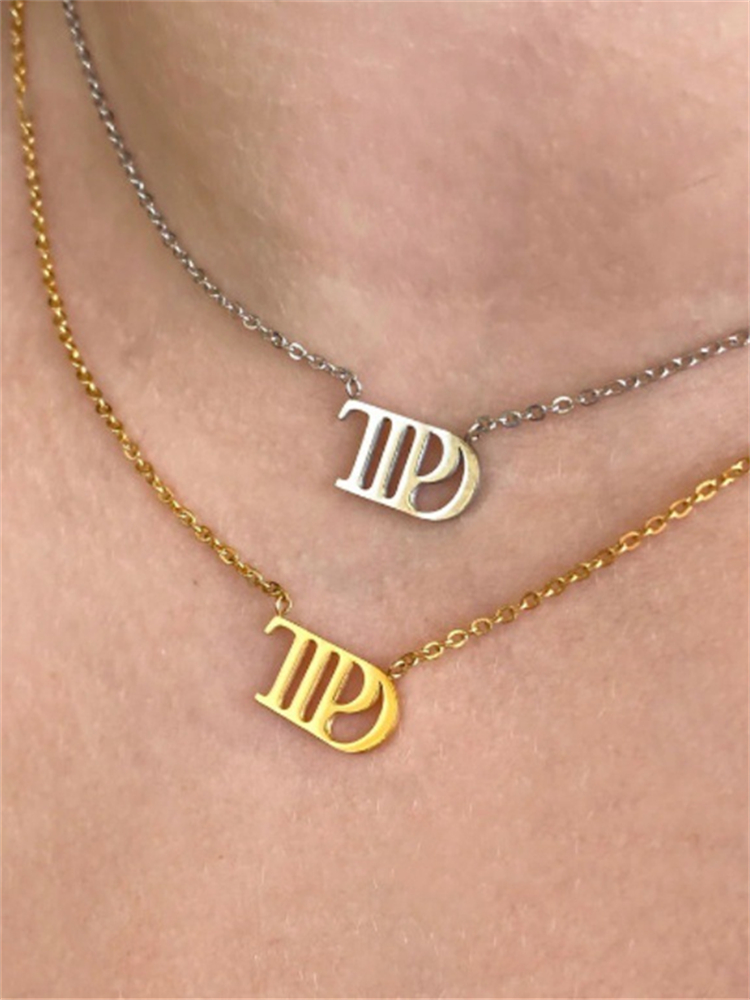 New Album Logo Inspired Carved Necklace
