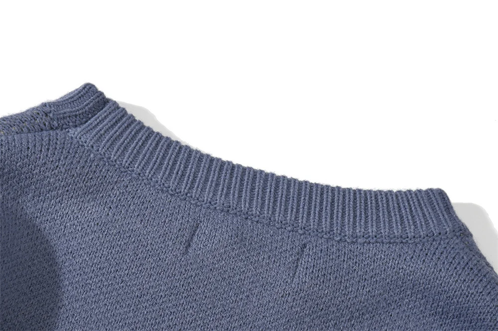 BUTTERFLY DRIP SWEATER