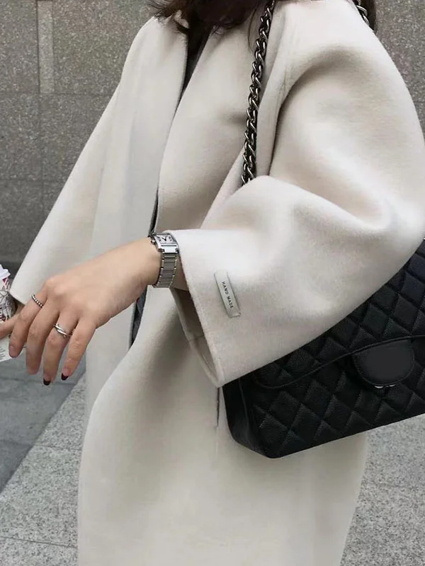 Elegant Collarless Woolen Coat: Long-Sleeved, Loose Fit, and Timelessly ...