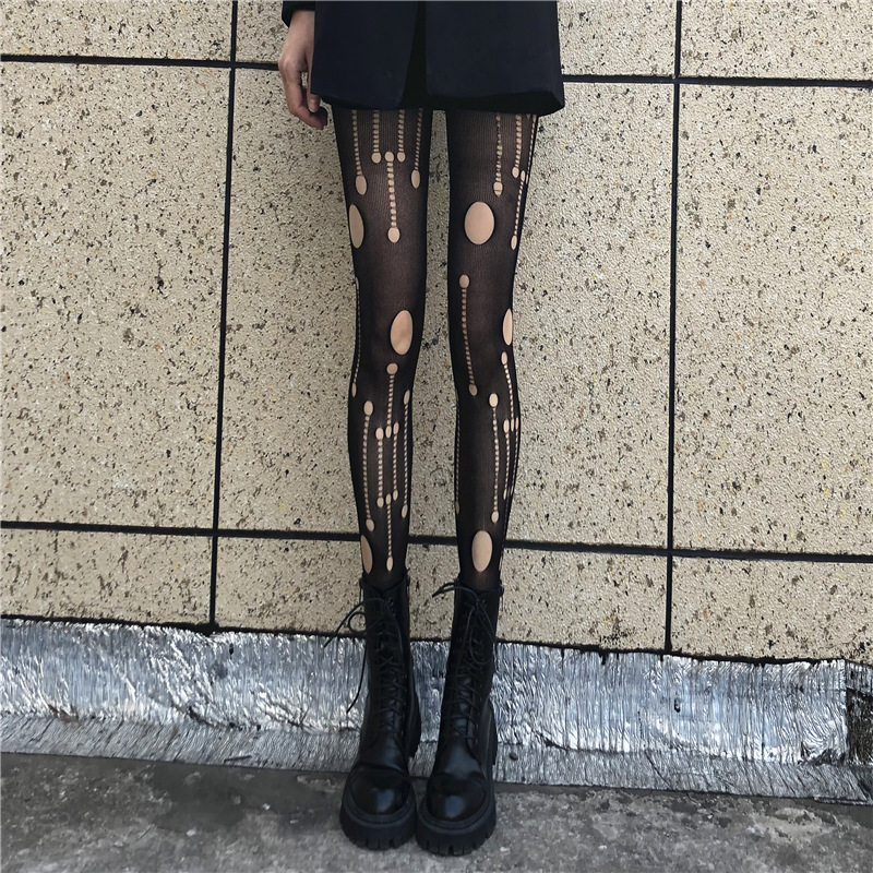 JK RIPPED FISHNET STOCKINGS