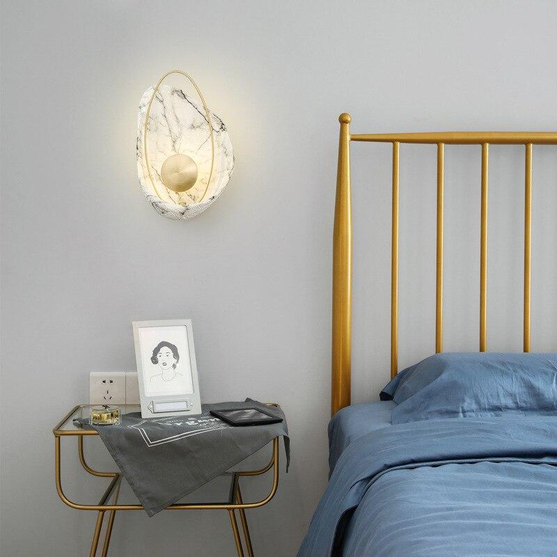 Emma - Shell wall lamp in copper and resin