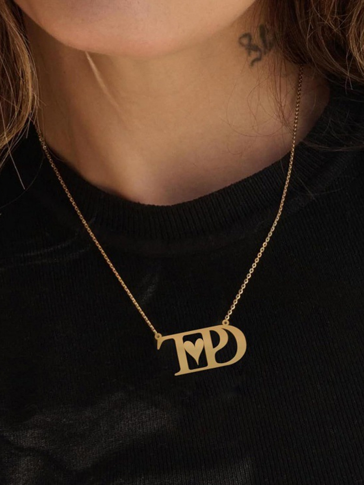 New Album Logo Inspired Carved Necklace