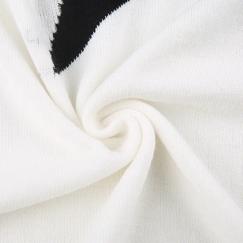 BLACK STAR RIPPED LONG SLEEVE KNIT SMOCK