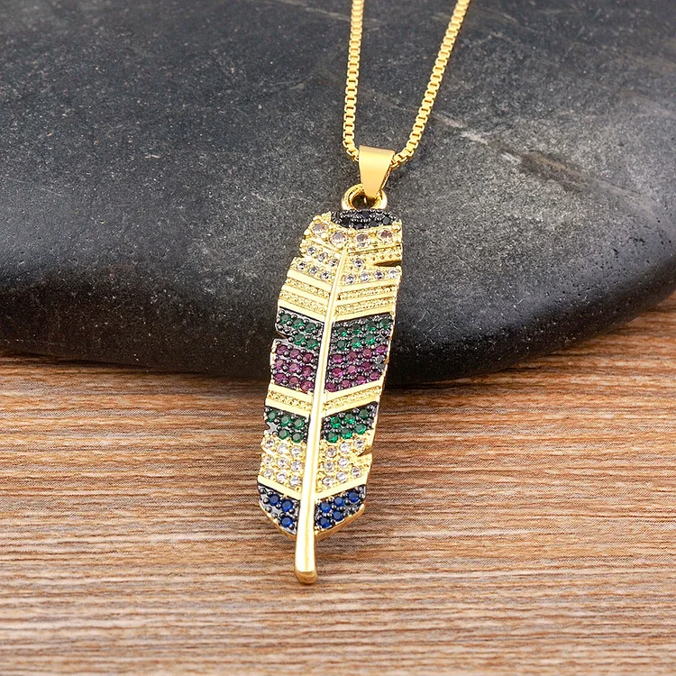 Celestial Plume: Rhinestone Feather Necklace Collection